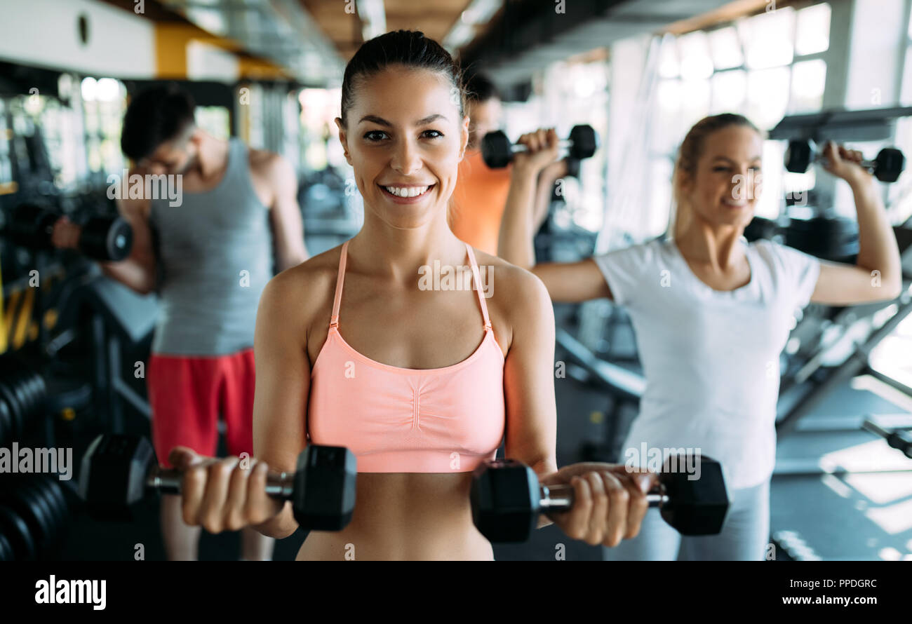 Group of people have workout in gym Stock Photo - Alamy