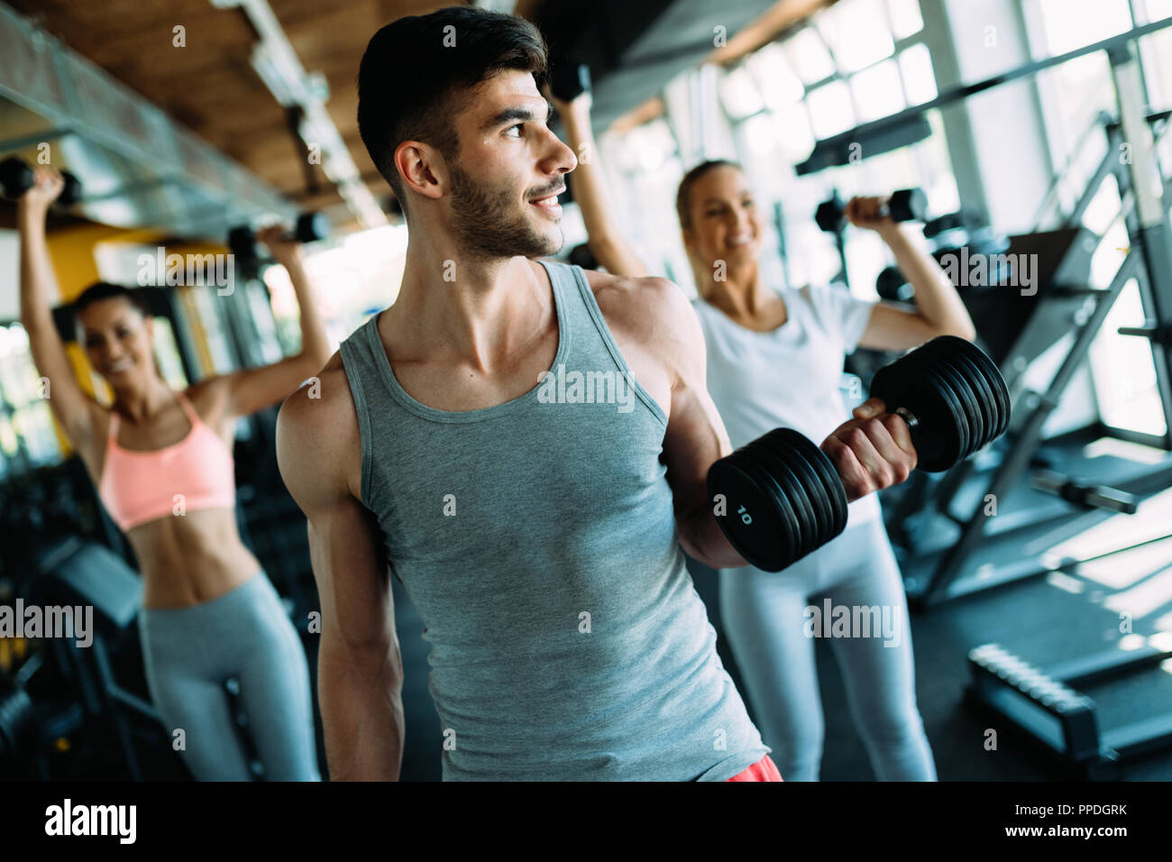 Group of people training in gym Stock Photo - Alamy