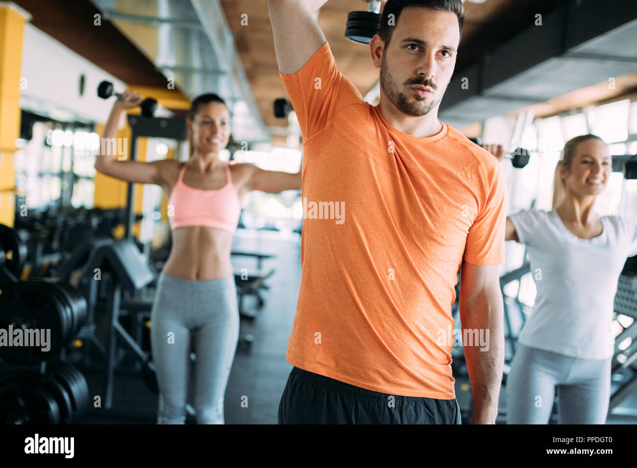 Group of people have workout in gym Stock Photo - Alamy