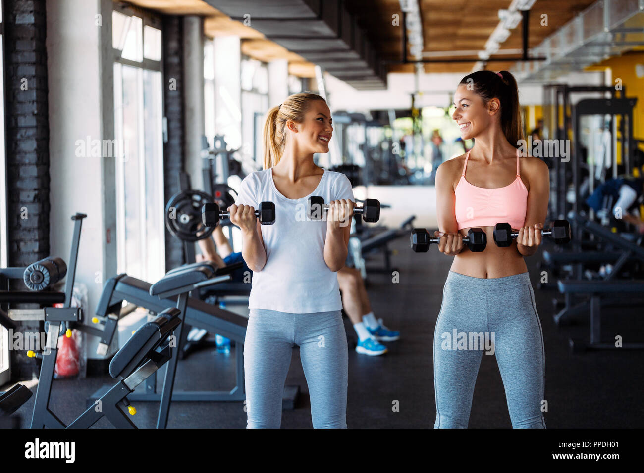 Young women in lift hi-res stock photography and images - Alamy