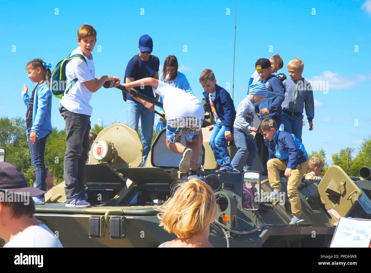 Children playing on army tank hi-res stock photography and images - Alamy