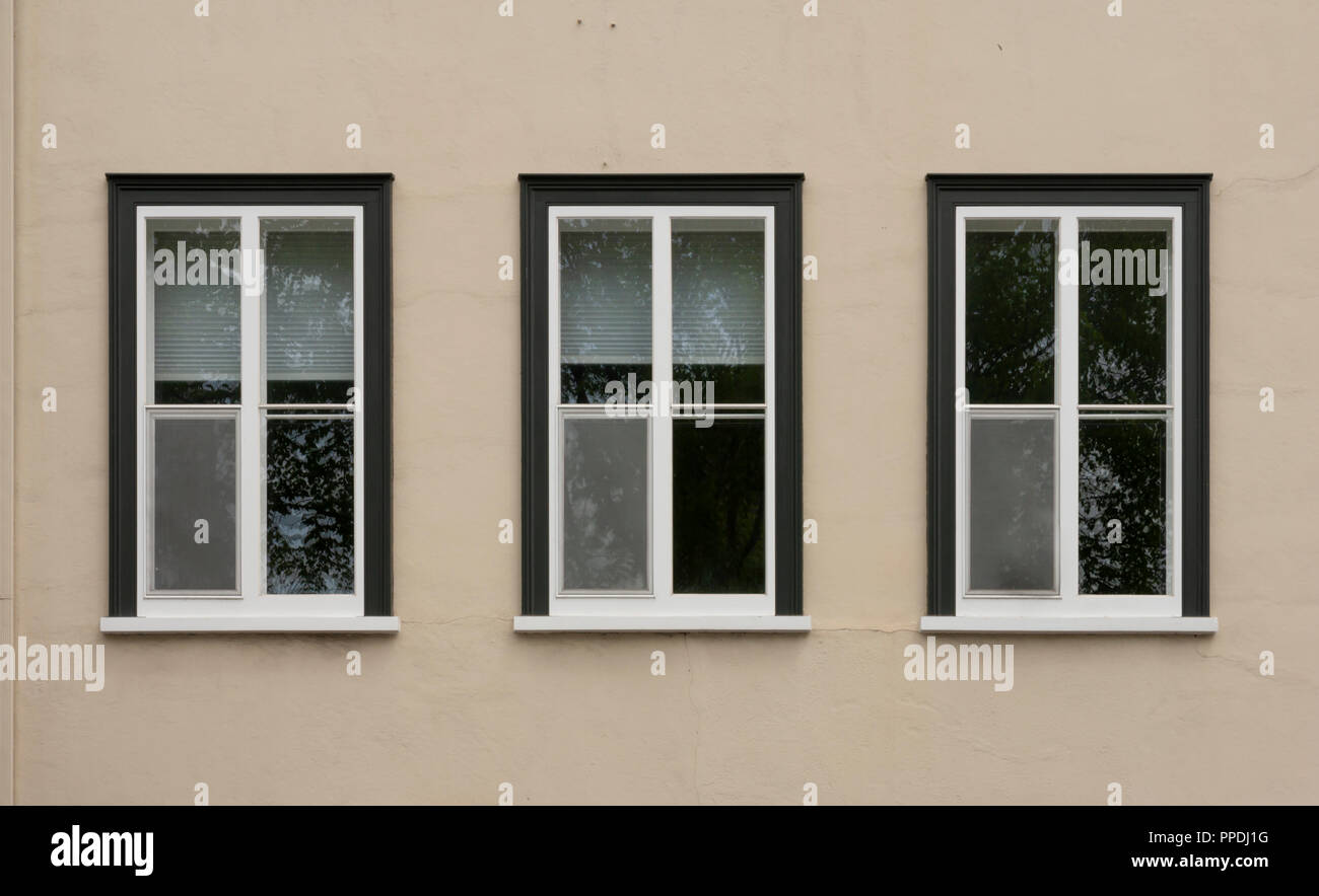 Row of windows on the facade of a residential building on Rue D'Auteuil ...