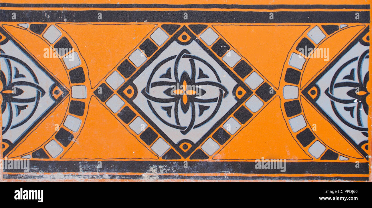 Detail of the traditional tiles from facade of old house. Decorative ...