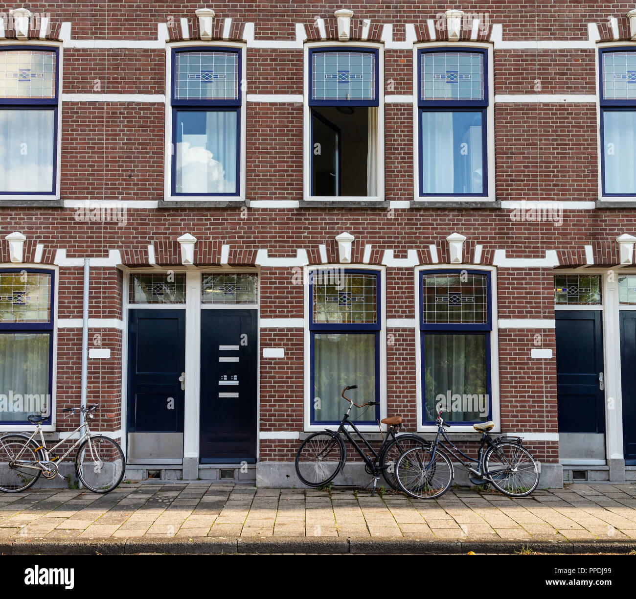 Rotterdam, Netherlands. Bicycles in front of traditional red brick ...