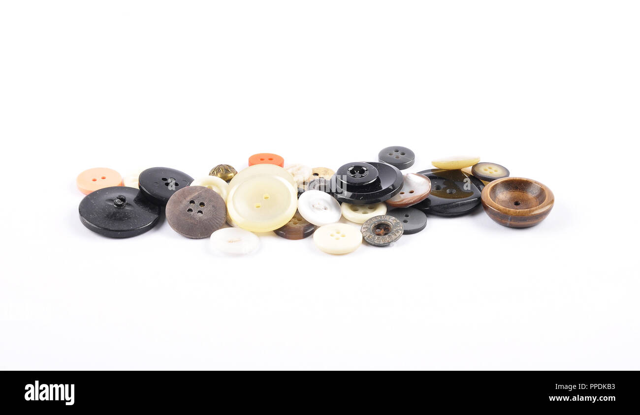 Old buttons on white background Stock Photo - Alamy
