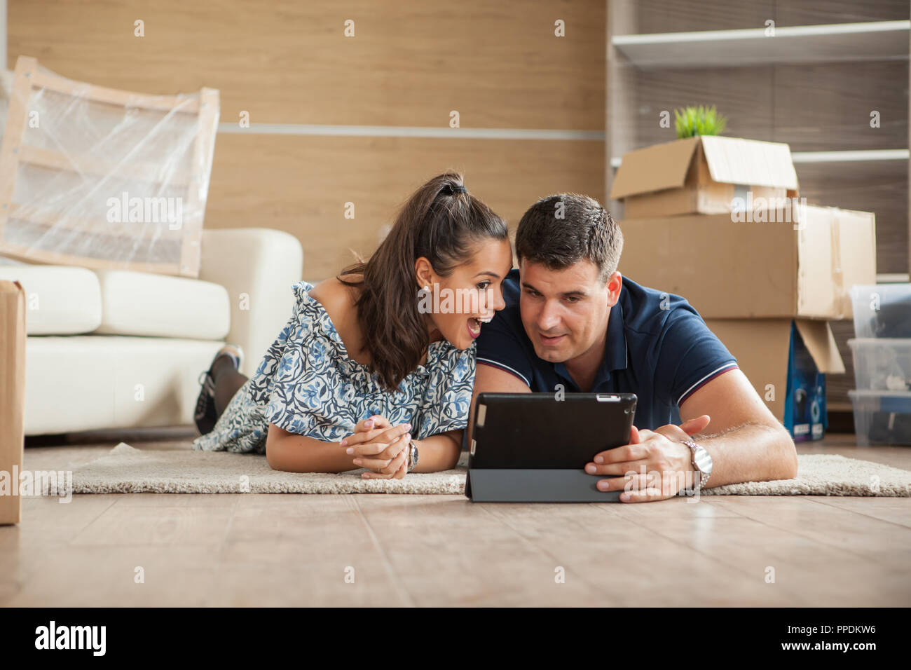 Wife and husband looking after things to buy for their new flat Stock ...