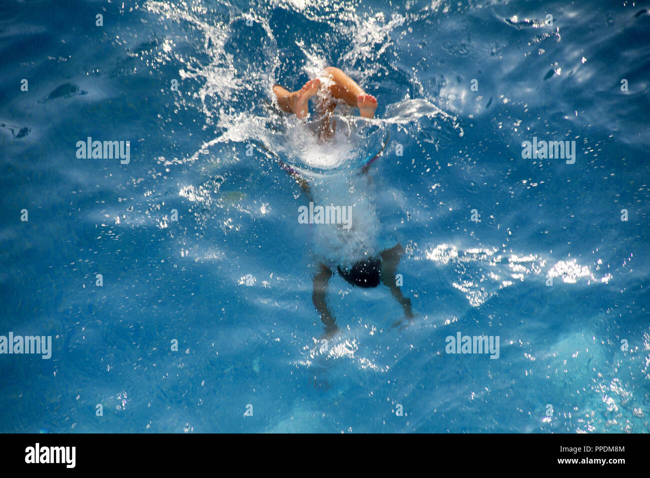 Girl dive into fresh water hi-res stock photography and images - Alamy