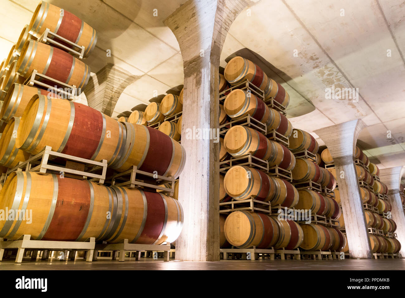 Wine barrels in cellar in Italy, Tuscan Stock Photo - Alamy