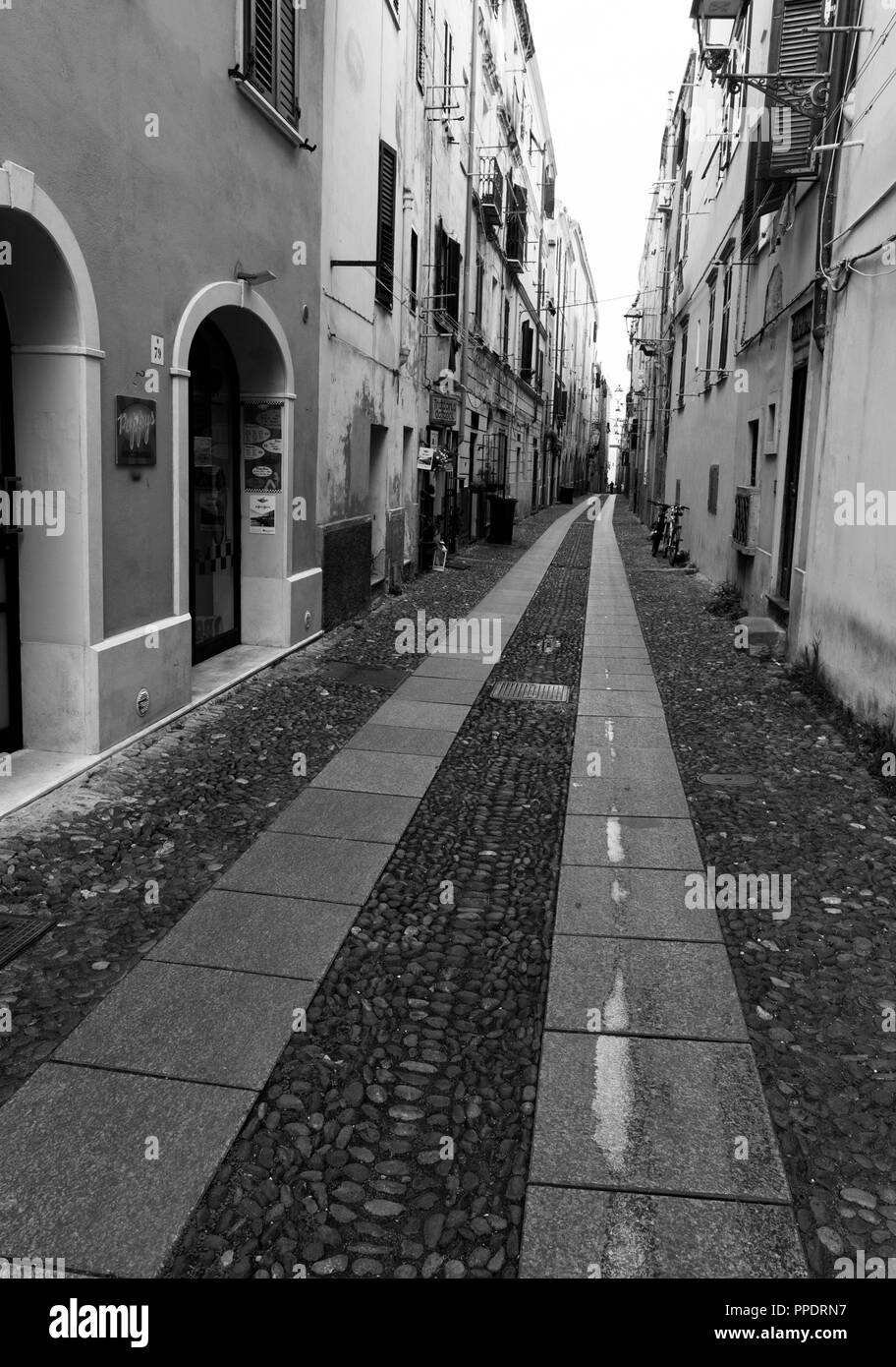 Narrow alleyway white houses Black and White Stock Photos & Images - Alamy