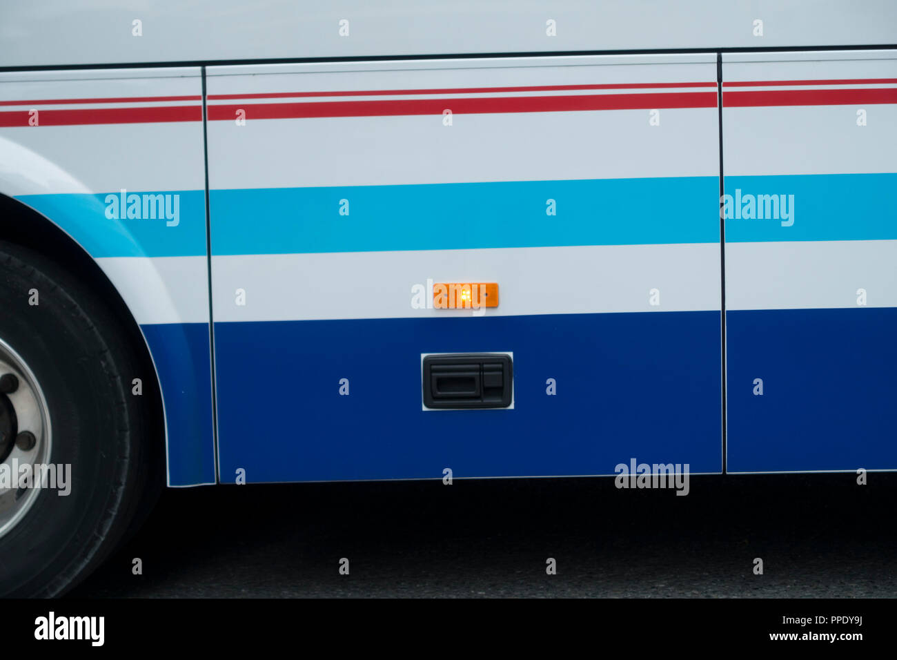 The side of a coach Stock Photo - Alamy