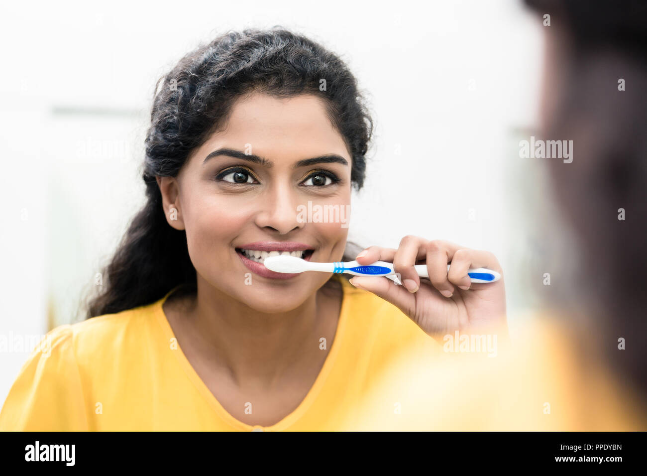 Indian woman brushing teeth hi-res stock photography and images - Alamy