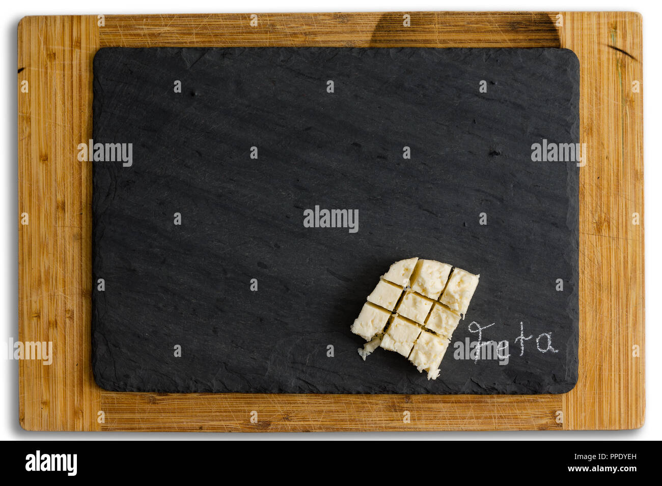 Diced serving of creamy traditional Greek feta cheese made from goat ...