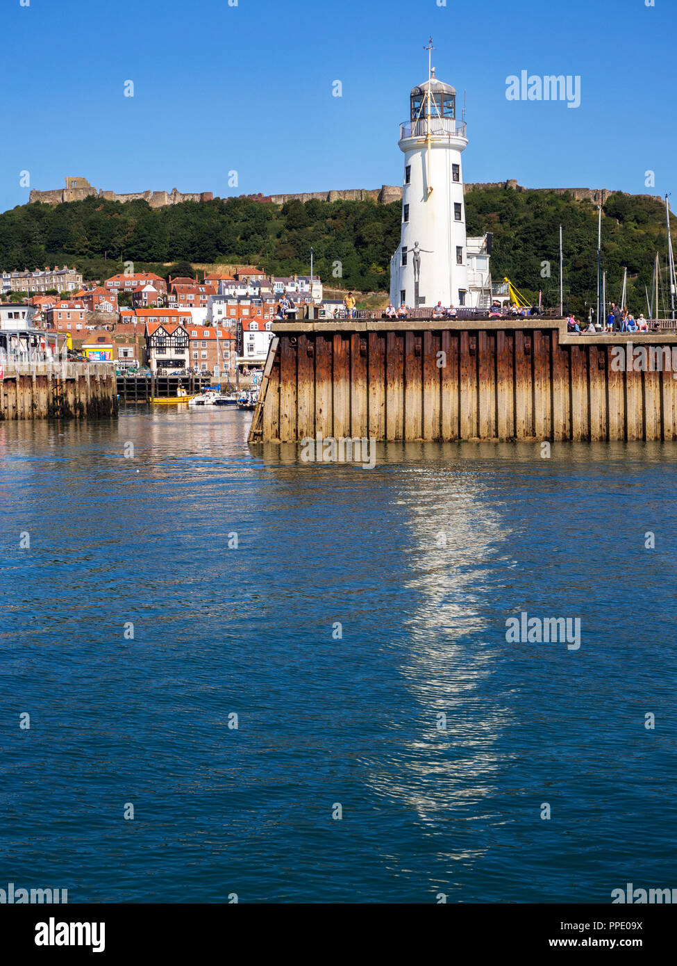 The lighthouse and seafront below Castle Hill at Scarborough North ...