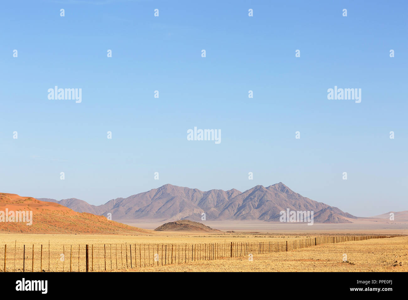 Iron fence of an rural african ranch in desert landscape Stock Photo ...