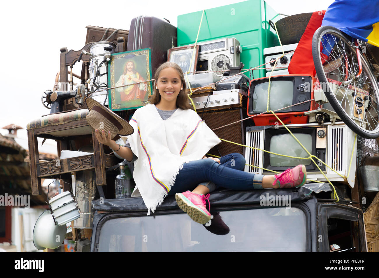 Happy Girl Enjoying move of old things Stock Photo - Alamy