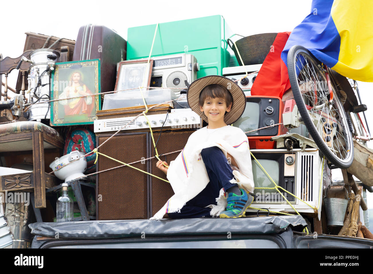 Happy Boy Enjoying Move of Old Things Stock Photo - Alamy