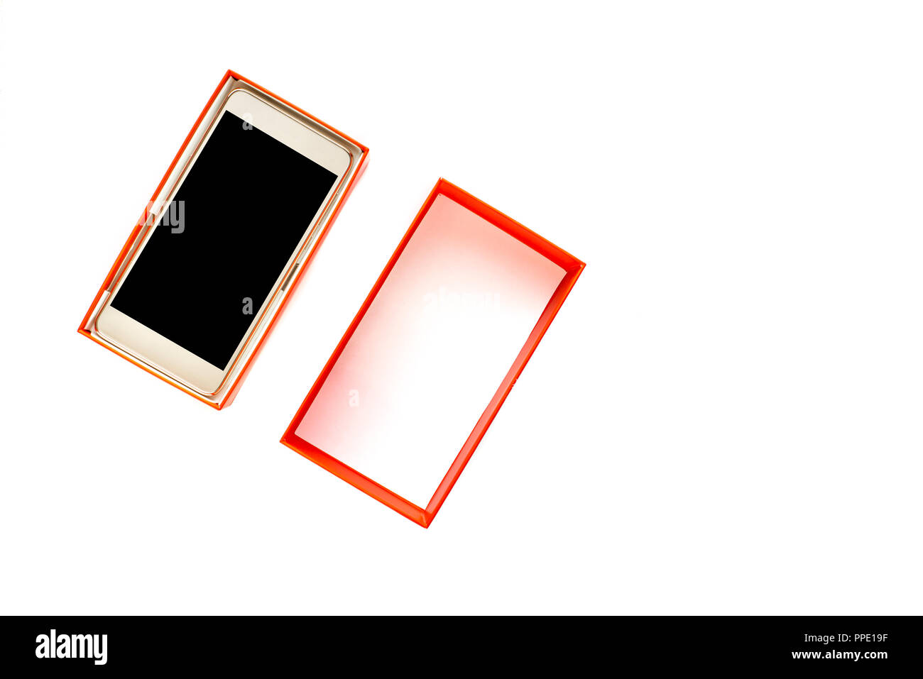 Isolated mobile phone, gift box with smartphone with black screen and ...