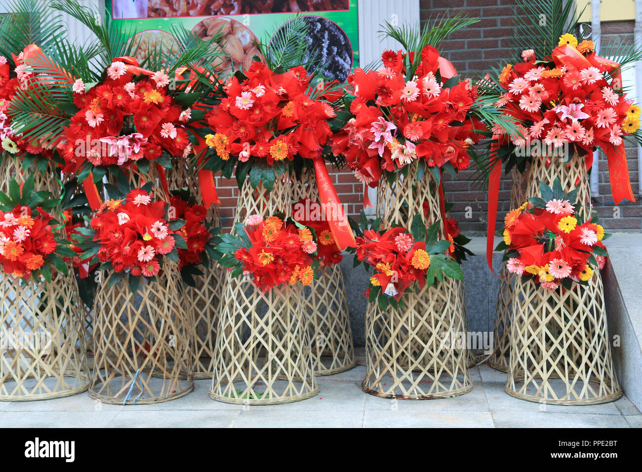 Flower arrangements on pedestal stands for sale at Dalian, China Stock ...