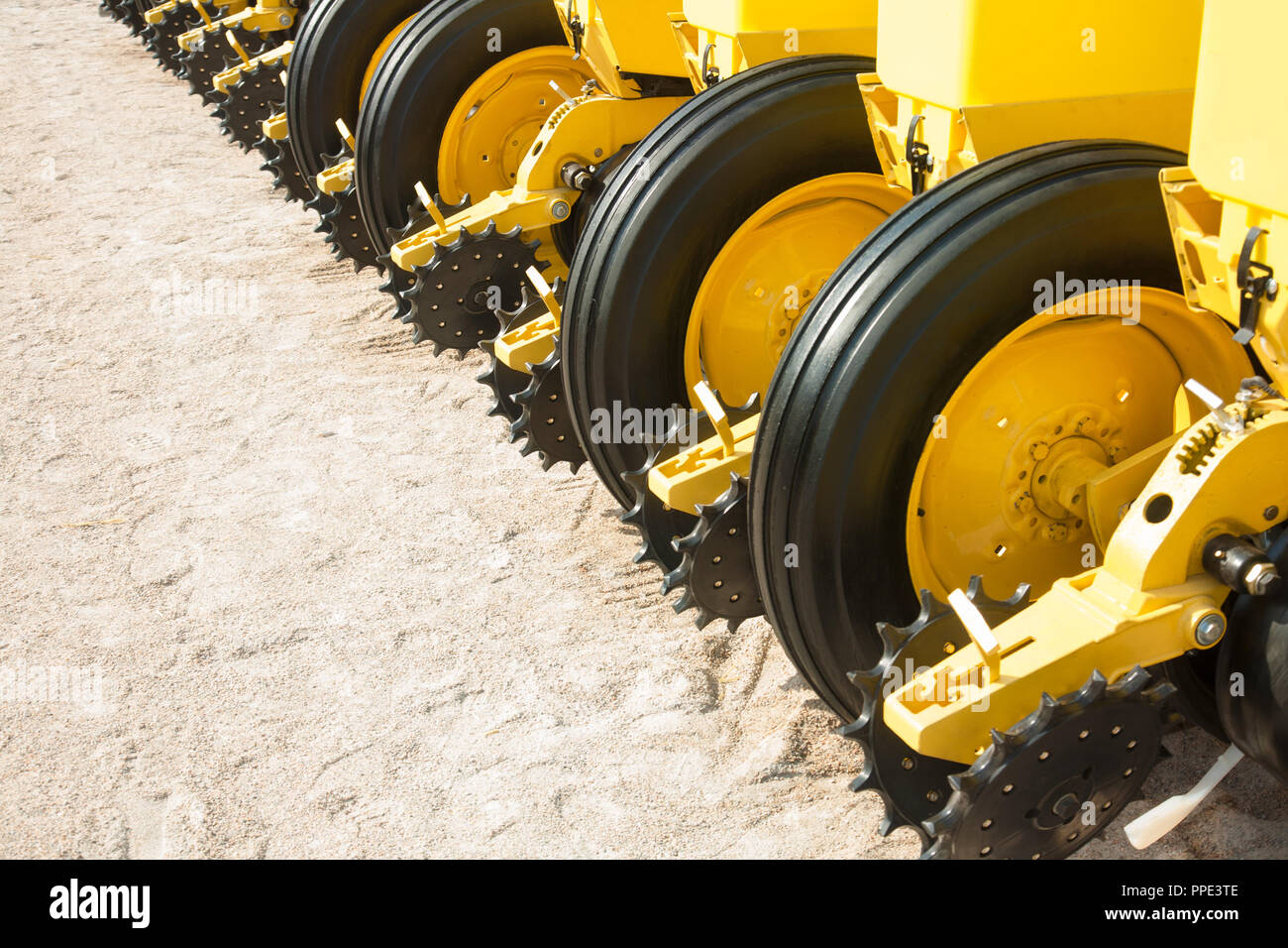 The new industrial agricultural seeder close up Stock Photo - Alamy