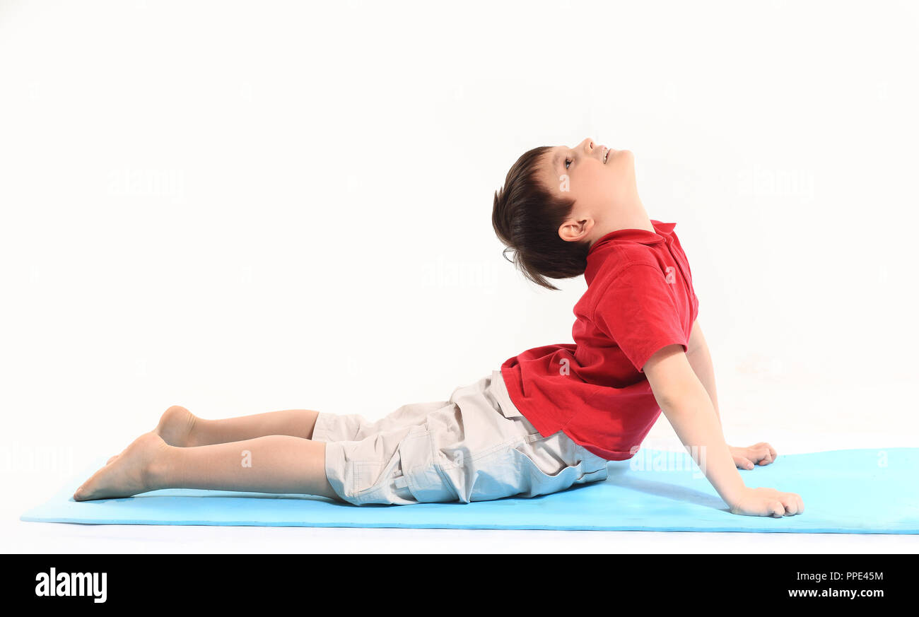 little boy does morning exercises.isolated on white background Stock ...