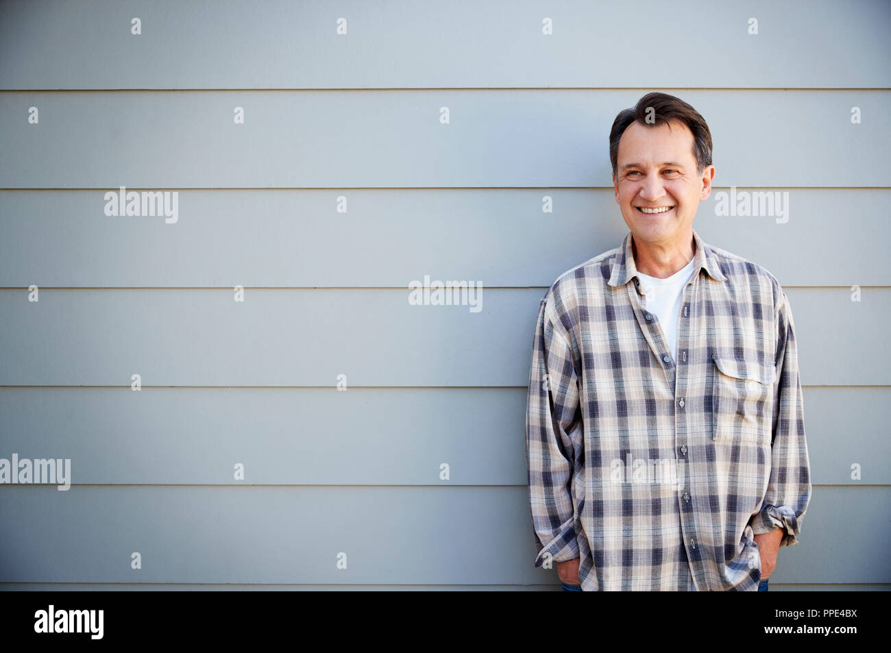 Mature senior man standing outdoors hi-res stock photography and images ...