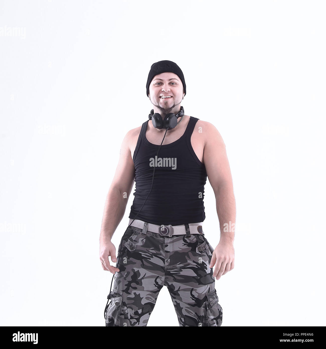 smiling cool rapper in a black hat.isolated on white background Stock ...