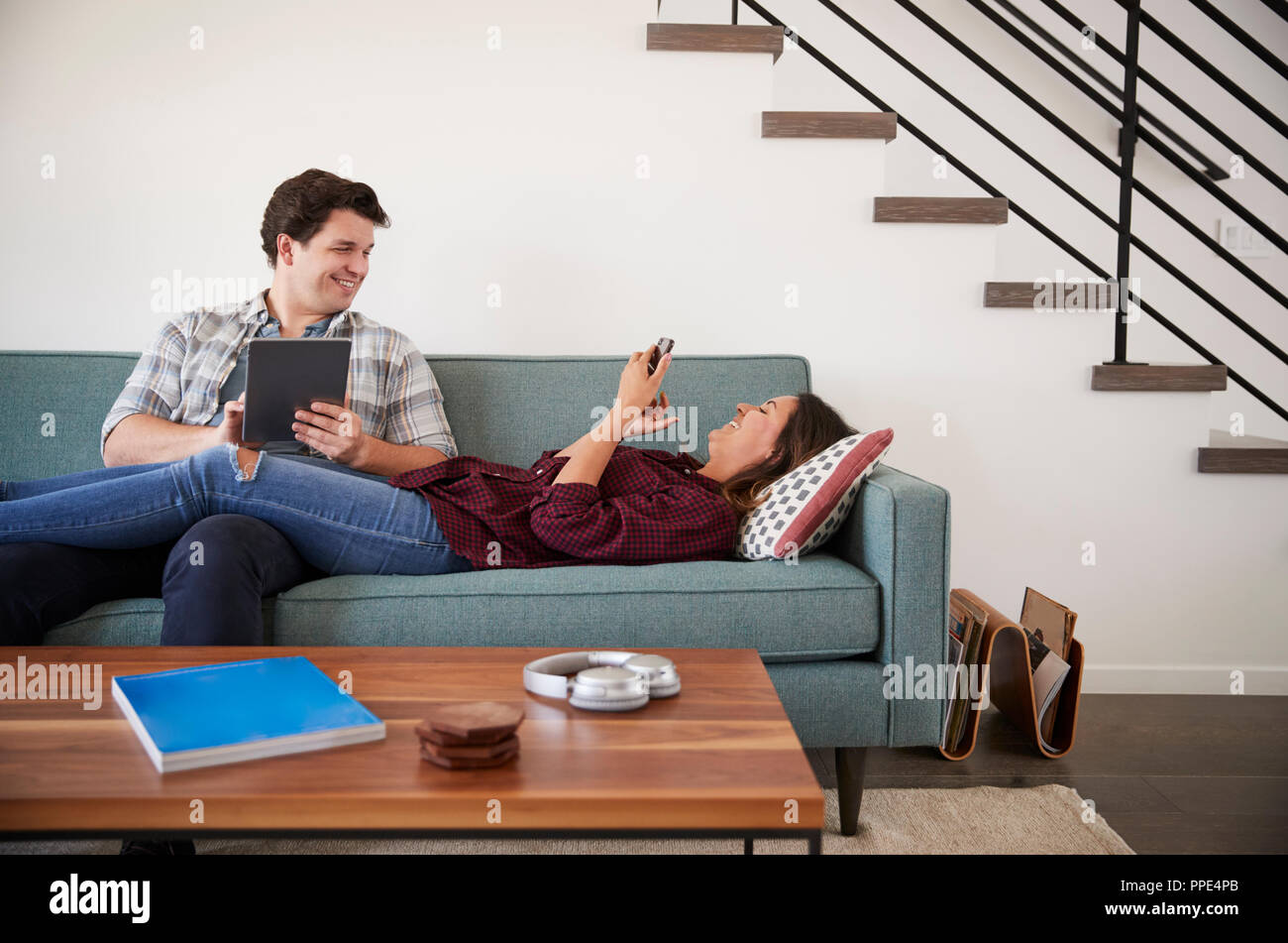 Mobile phone with copy space on sofa hi-res stock photography and ...