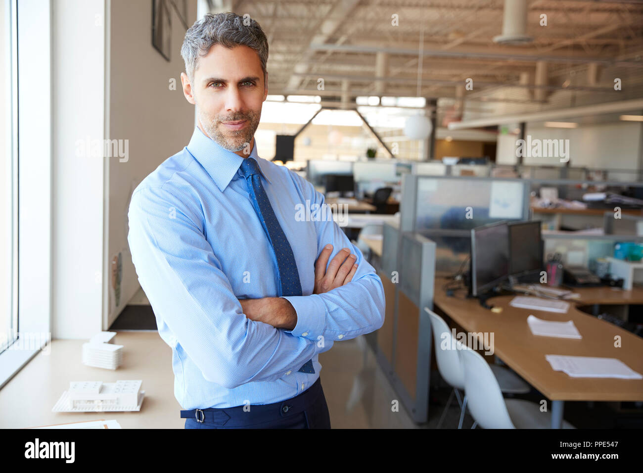 White male architect in open plan office looking to camera Stock Photo ...