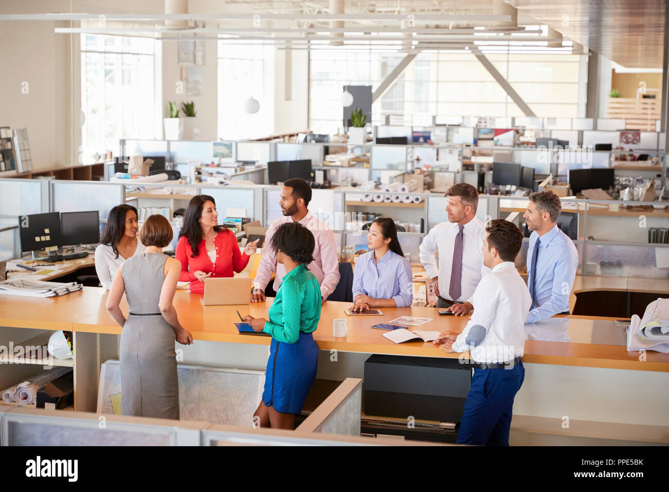 Business team meeting in an open plan office, elevated view Stock Photo ...