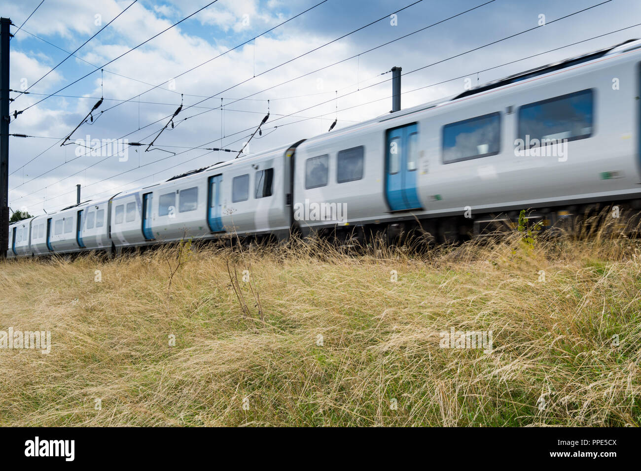 Rail Travel. Fast train passing on a long distance journey Stock Photo ...