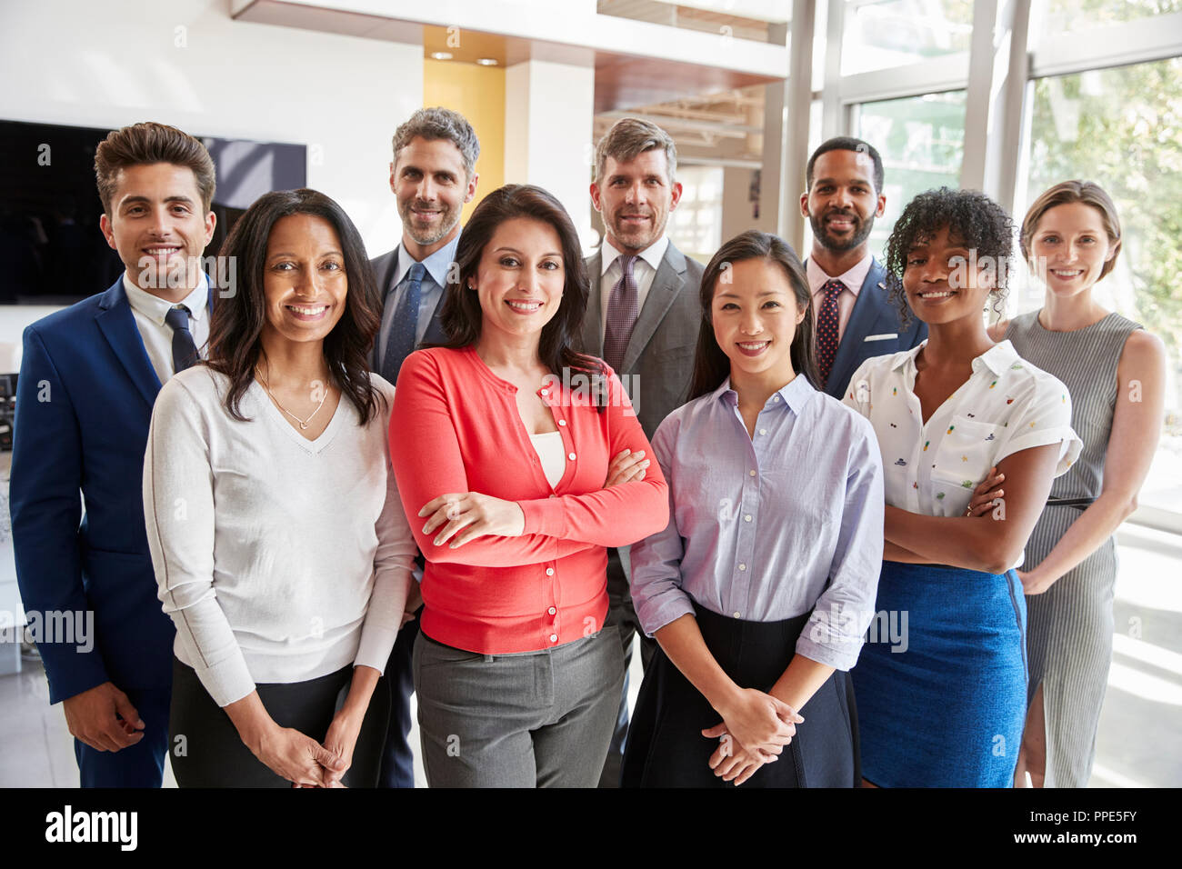 Smiling corporate business team, group portrait Stock Photo - Alamy