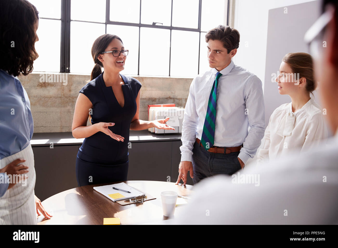 Female manager addressing team hi-res stock photography and images - Alamy