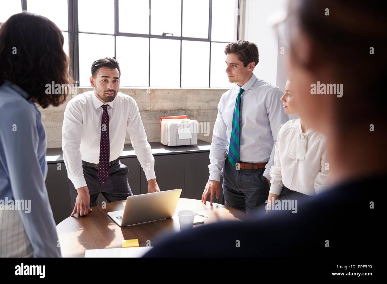 Boardroom person addressing group hi-res stock photography and images ...