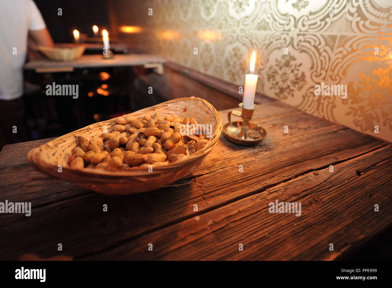 Candles and a bowl of peanuts in the "Baby Jane" bar at ...