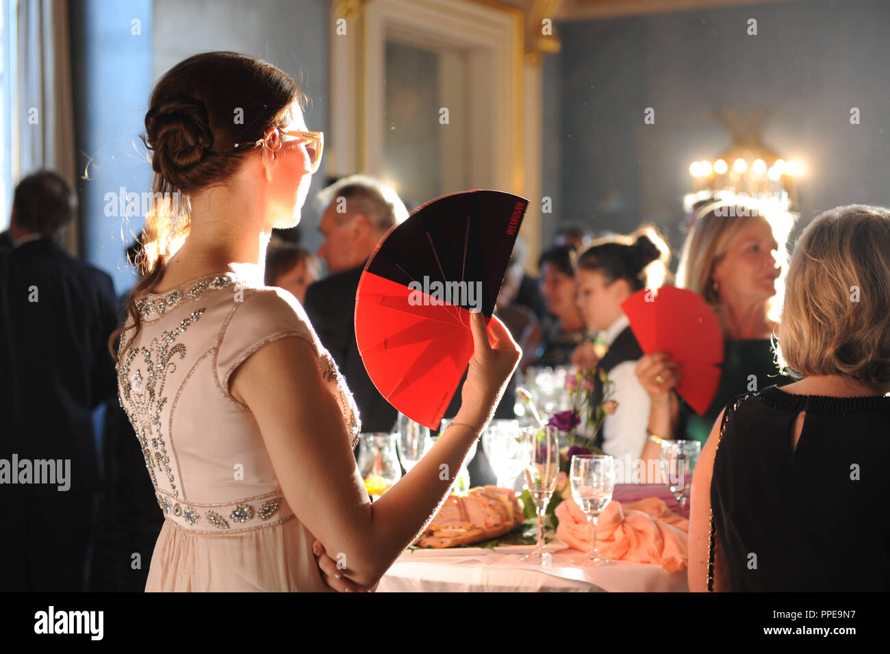 Opera for All in Munich: Lady with a fan at the sponsors reception ...