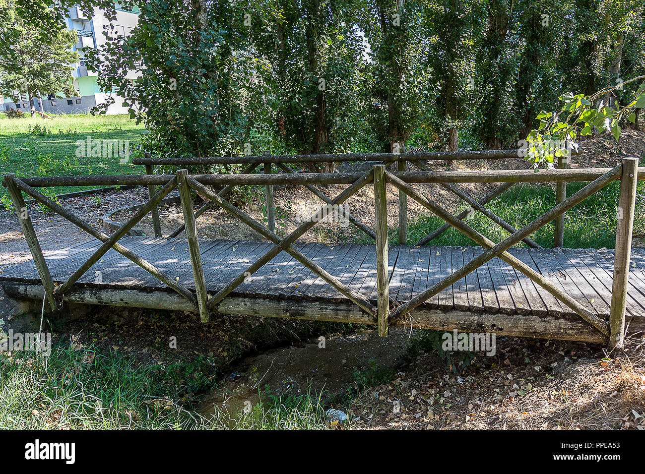 Old wooden bridge waterfall hi-res stock photography and images - Alamy