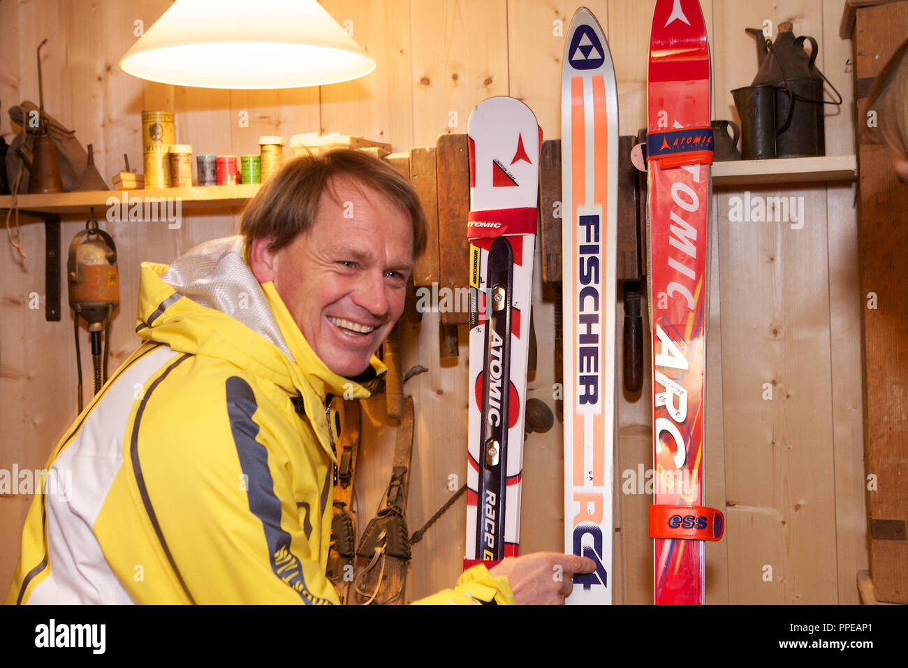 Ski world champion and Olympic champion Markus Wasmeier with old skis ...