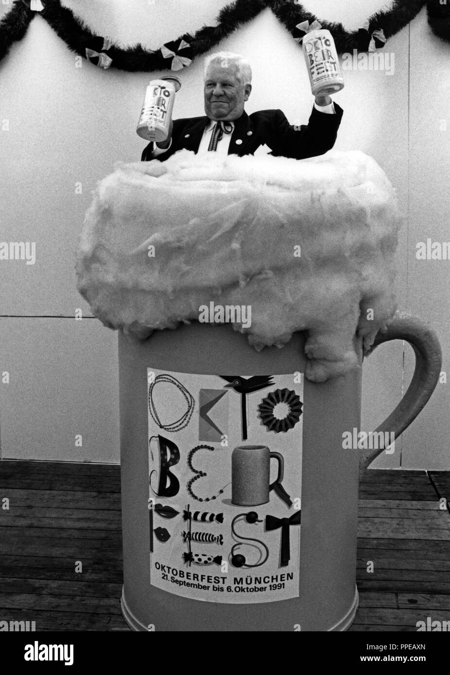 Owner of the Braeurosl-Oktoberfest-Tent Willy Heide with beer mugs by ...