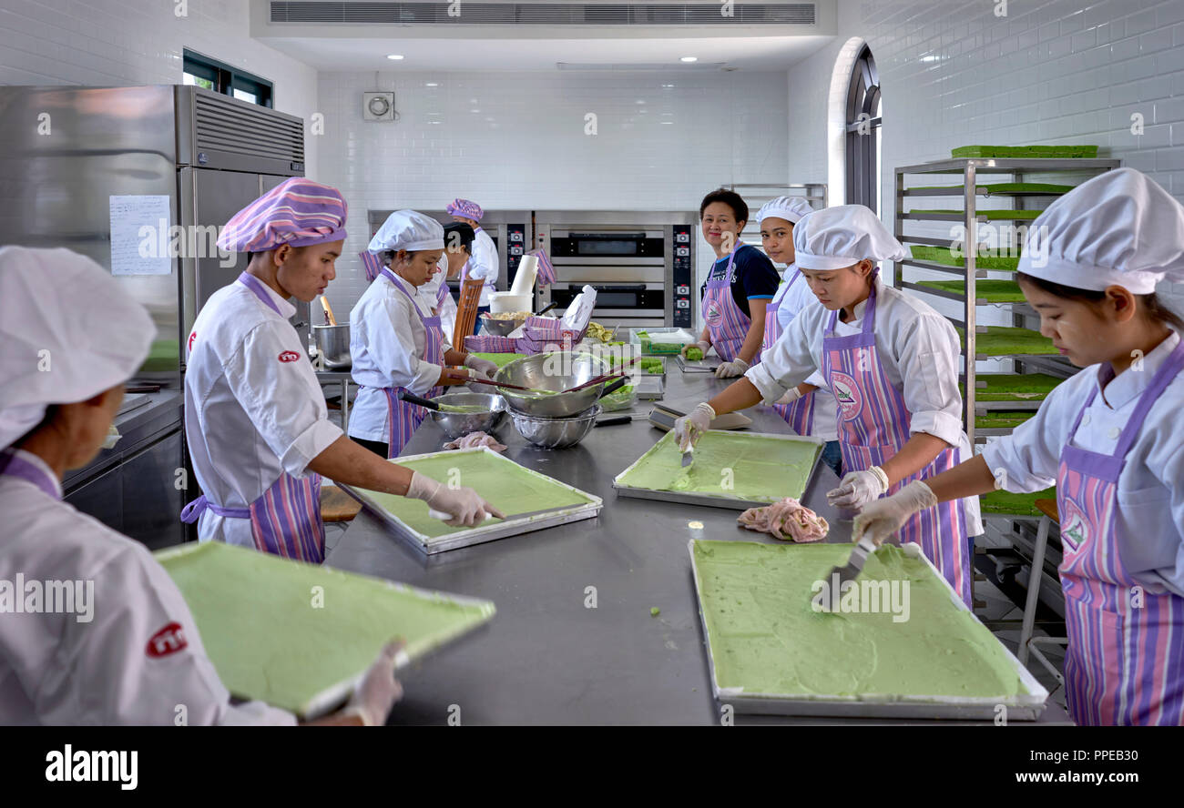 Bakery interior Kitchen. Thailand female bakers. Thai women baking ...