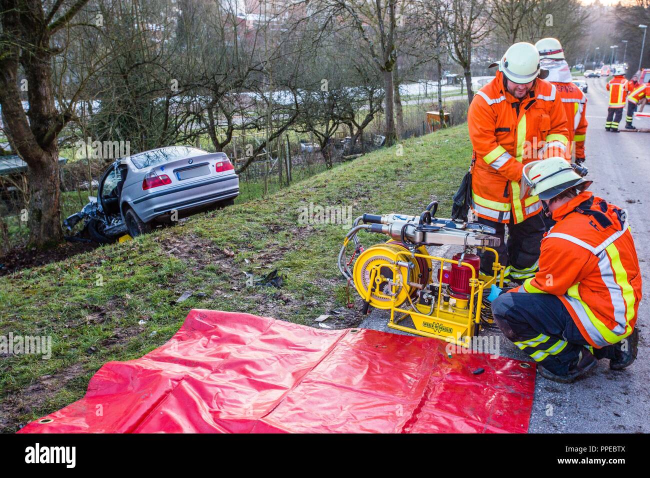 A car robberer is trapped inside the stolen BMW after a head-on ...
