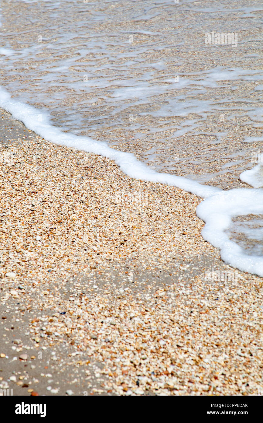pebble stones on the sea beach in the surf Stock Photo - Alamy