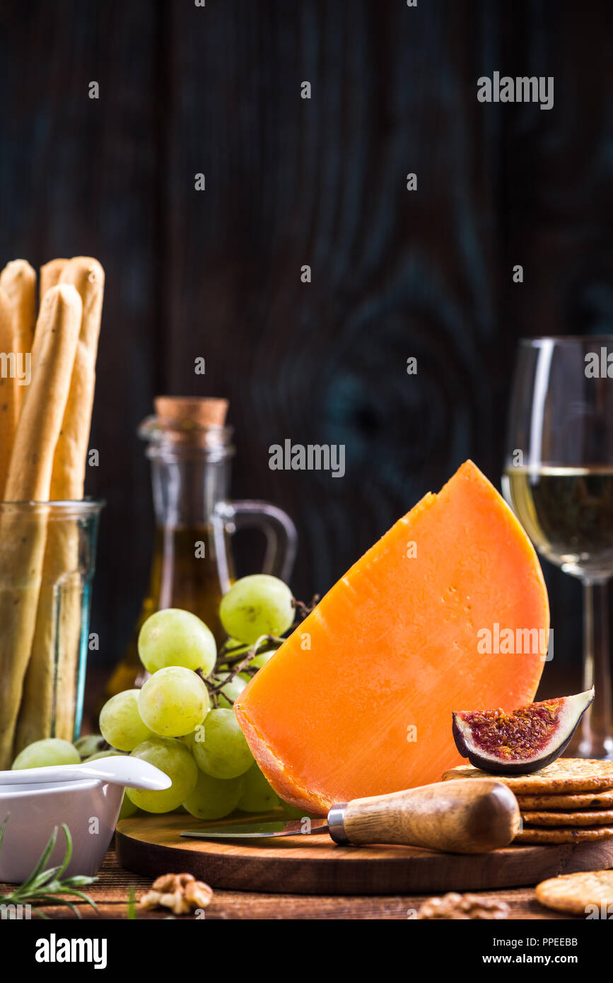 American Cheddar orange cheese Stock Photo - Alamy