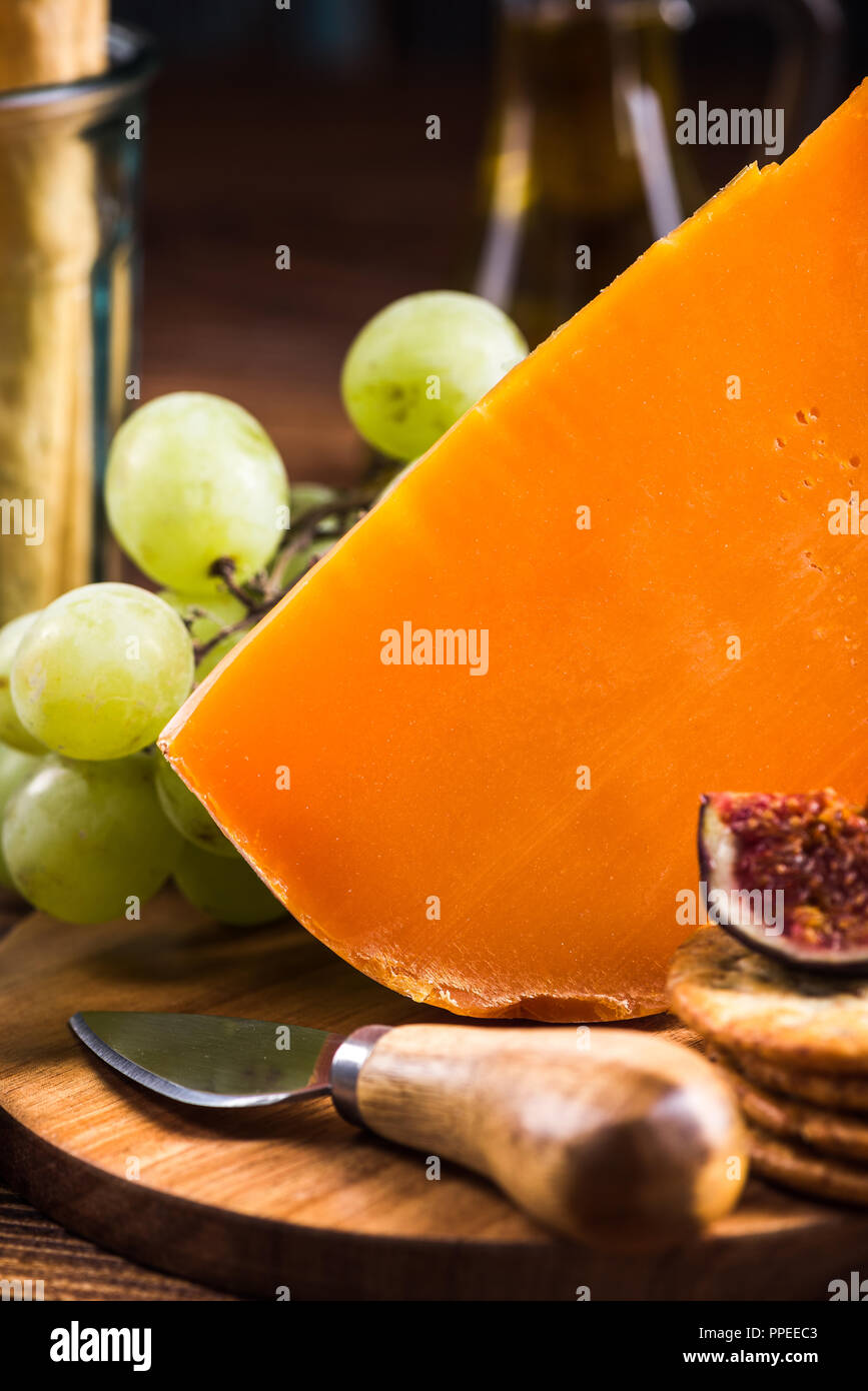 Serving American Cheddar cheese Stock Photo - Alamy