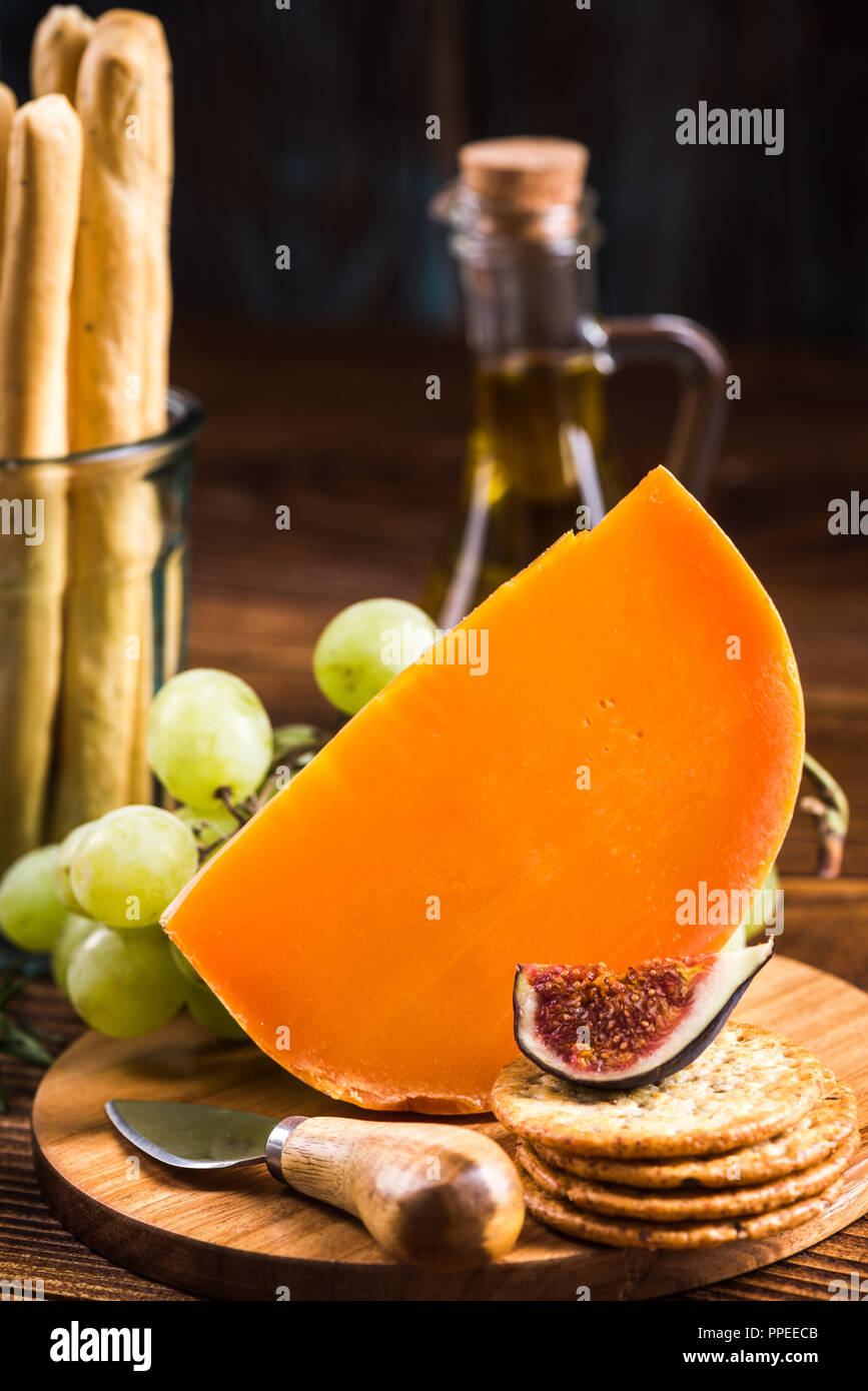 Serving American Cheddar cheese Stock Photo - Alamy