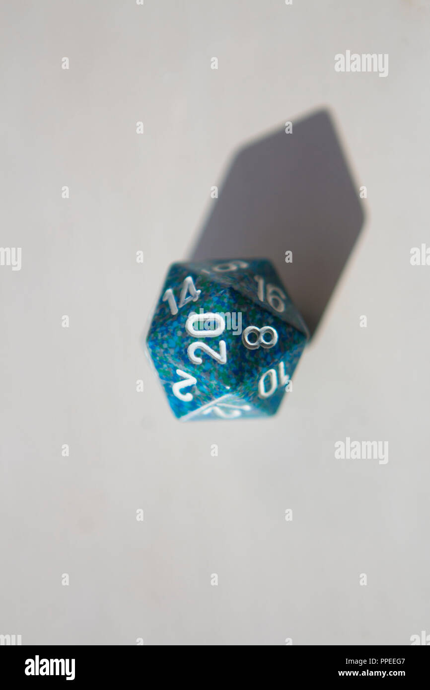 A D20 used for critical roll in tabletop role-playing game Dungeons and ...