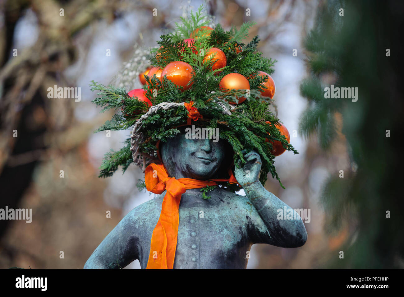 Liesl-Karlstadt statue with Christmas bauble cap at the Liesl Karlstadt ...
