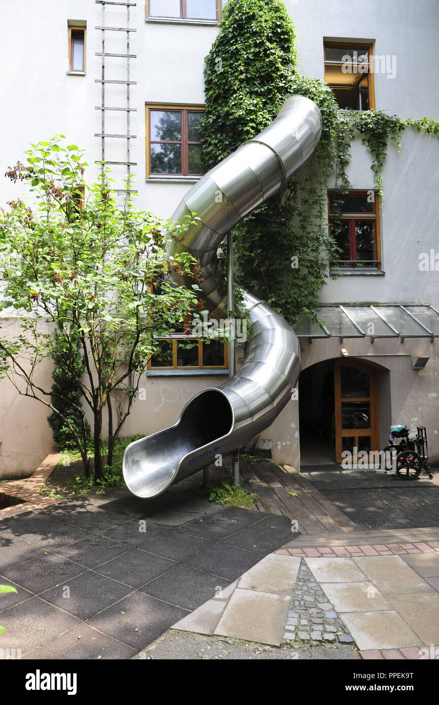 A slide in the courtyard of the children's playground in the ...