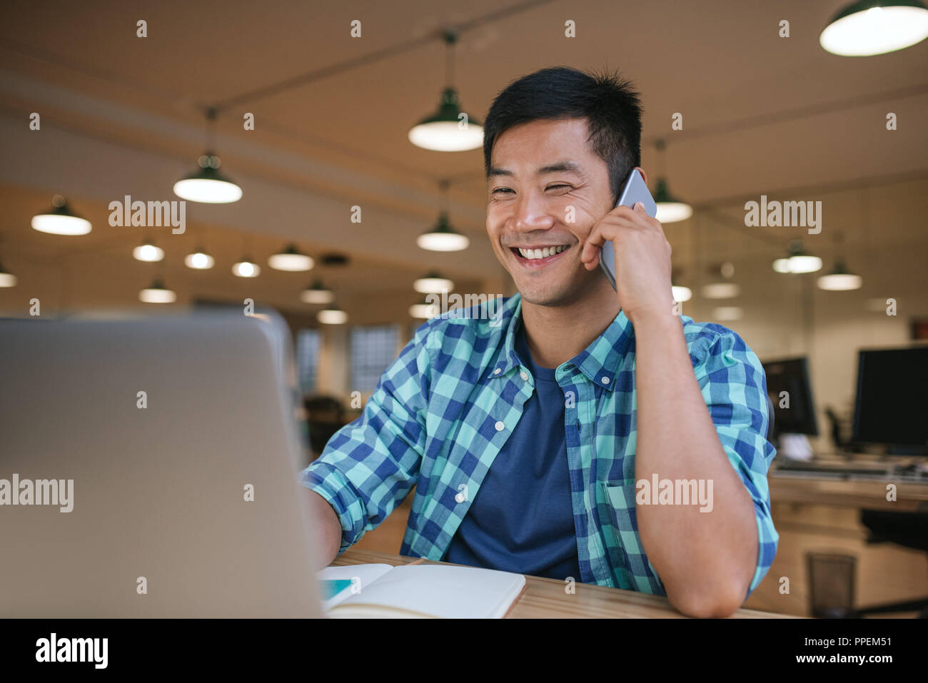 Happy asian businessman talking hi-res stock photography and images - Alamy