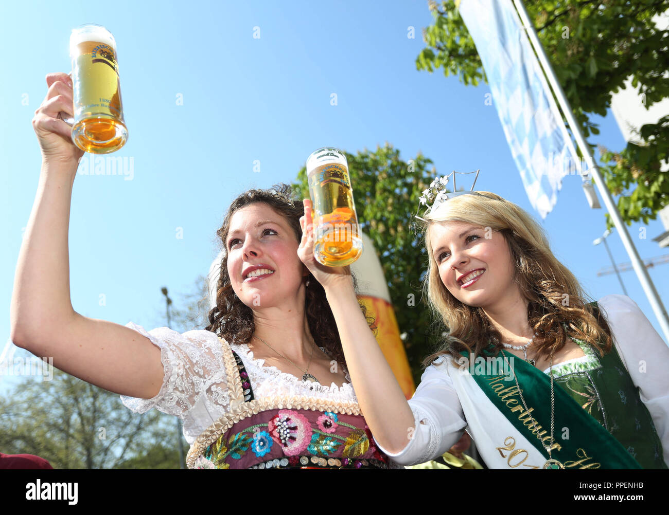 The Bavarian Beer Queen Maria Krieger (left) and the Hallertau Hop ...