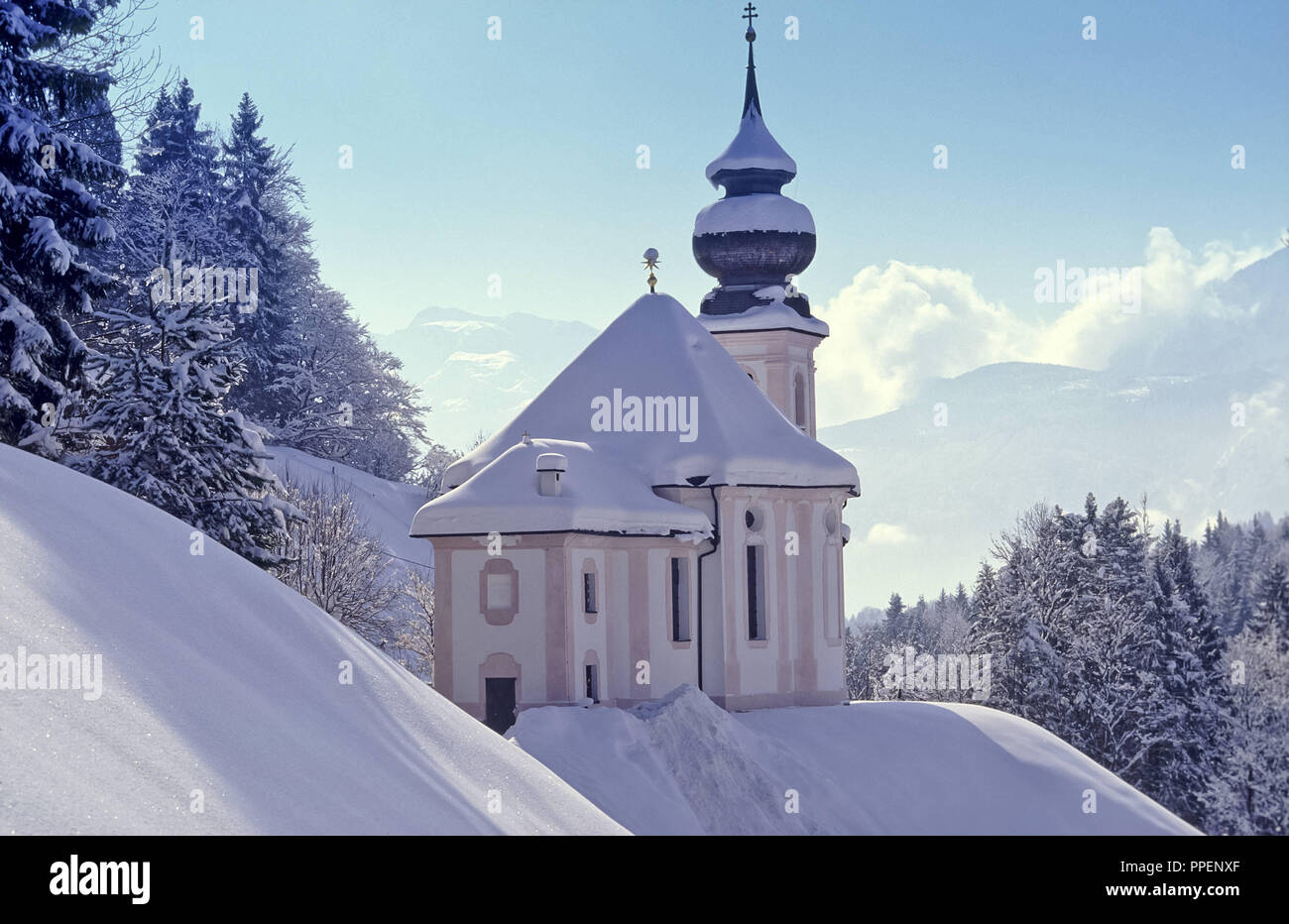 Pilgrimage church maria gern in winter and watzmann in background hi ...